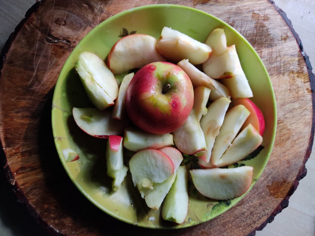 Plate with fresh apple on wooden board - PixaHive