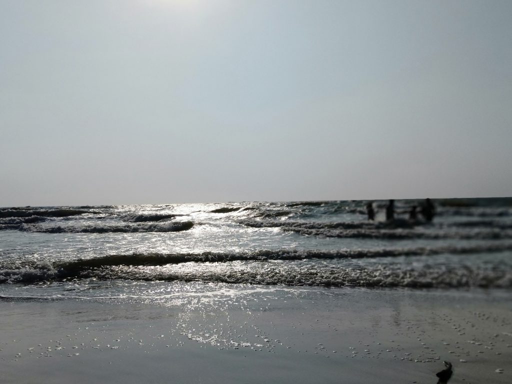 Sunlight on waves at beach - PixaHive