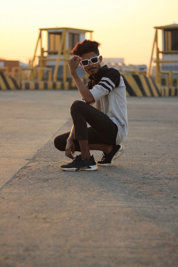 boy posing on a road - PixaHive