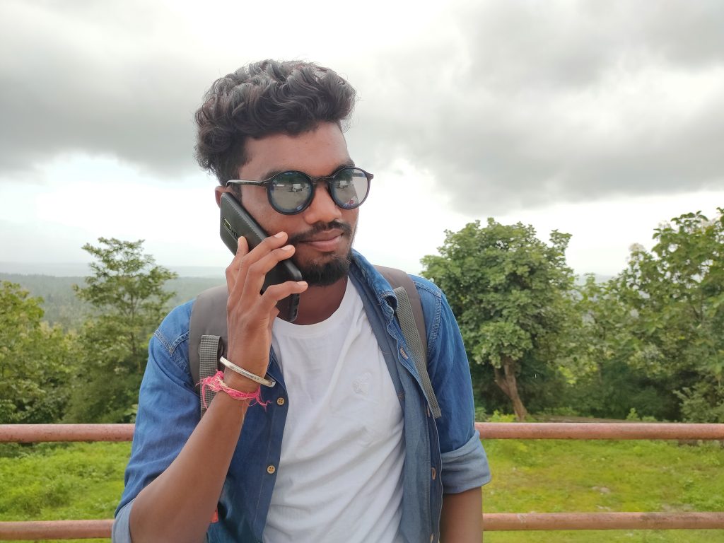 A boy attending phone call - PixaHive