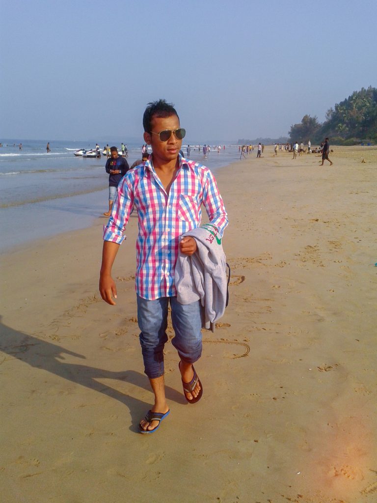 A boy waling on a beach - PixaHive