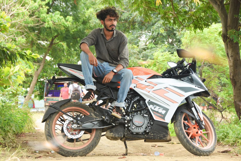 A model stylish boy on bike - PixaHive