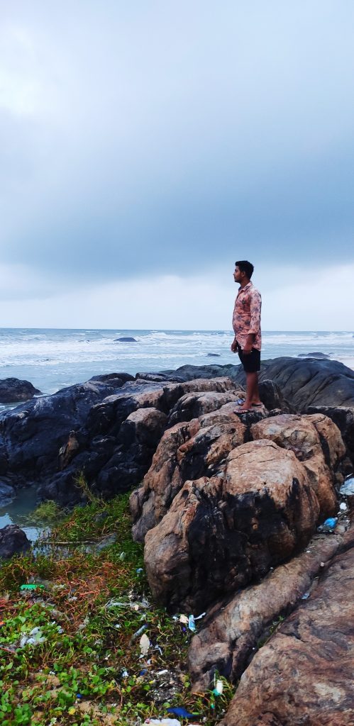 A boy on a rock - PixaHive