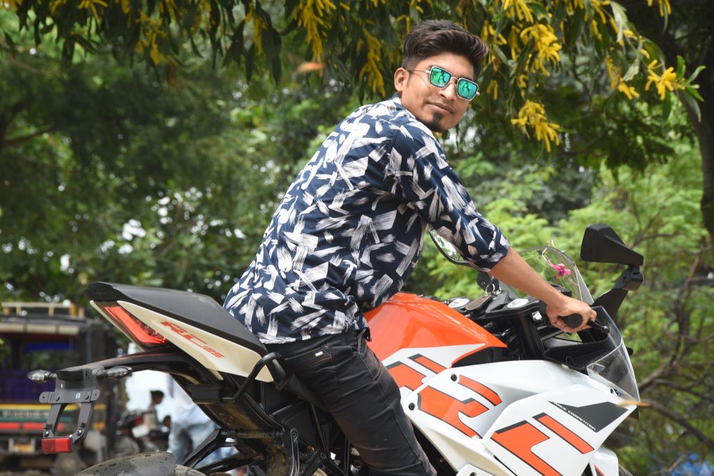 Boy posing on KTM bike - PixaHive