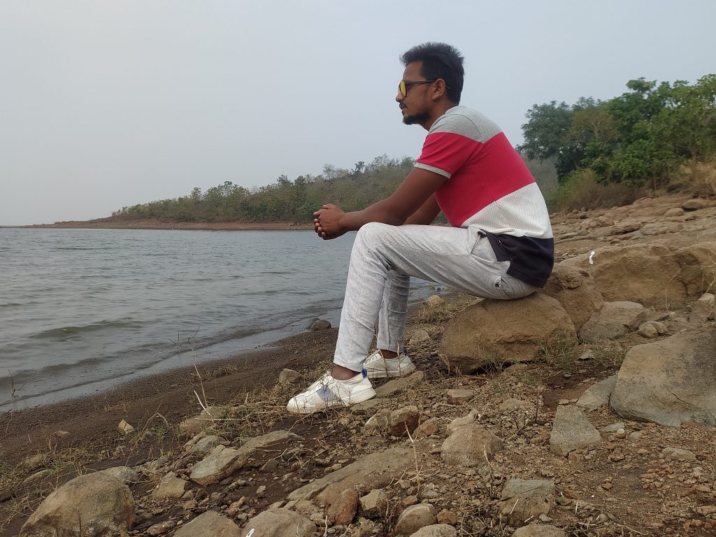 Boy posing on beach - PixaHive