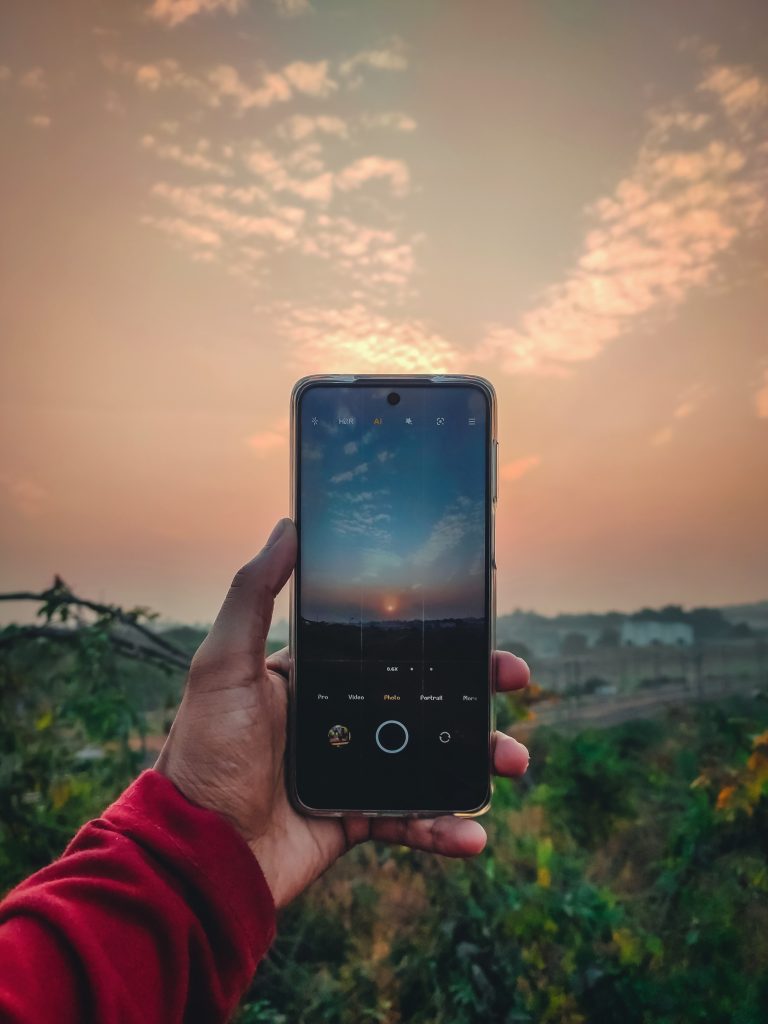 Capturing sunset view in mobile phone - PixaHive