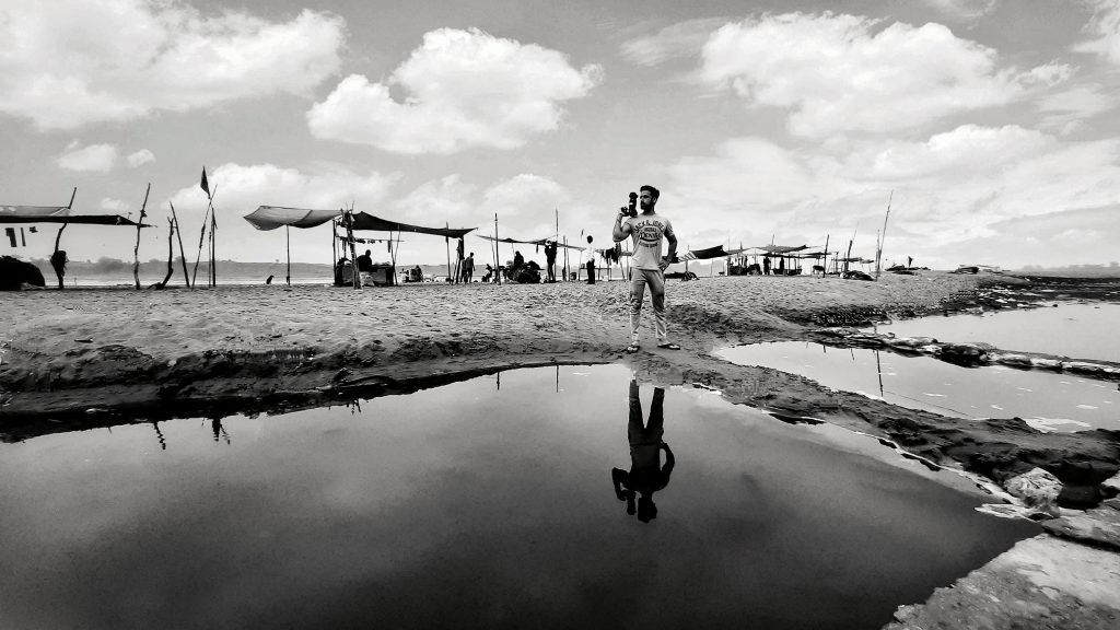 Guy reflection in water - PixaHive