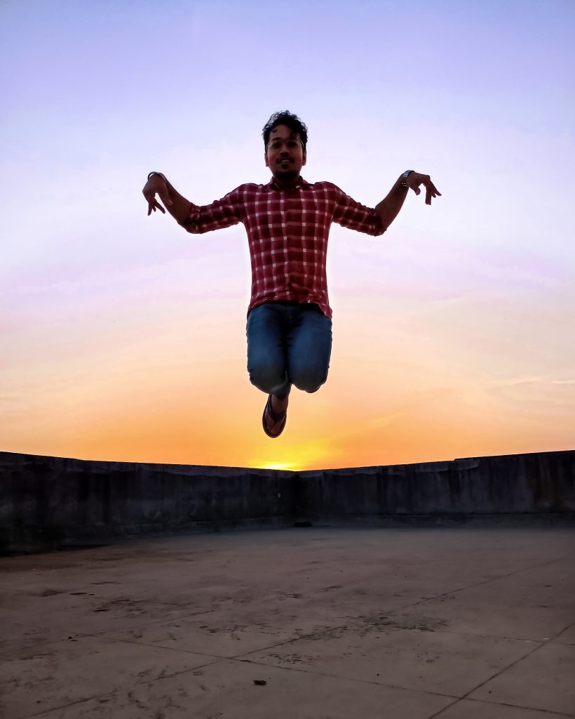 Man jumping on roof - PixaHive