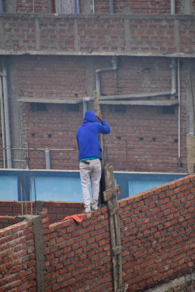 Man standing on wall - PixaHive