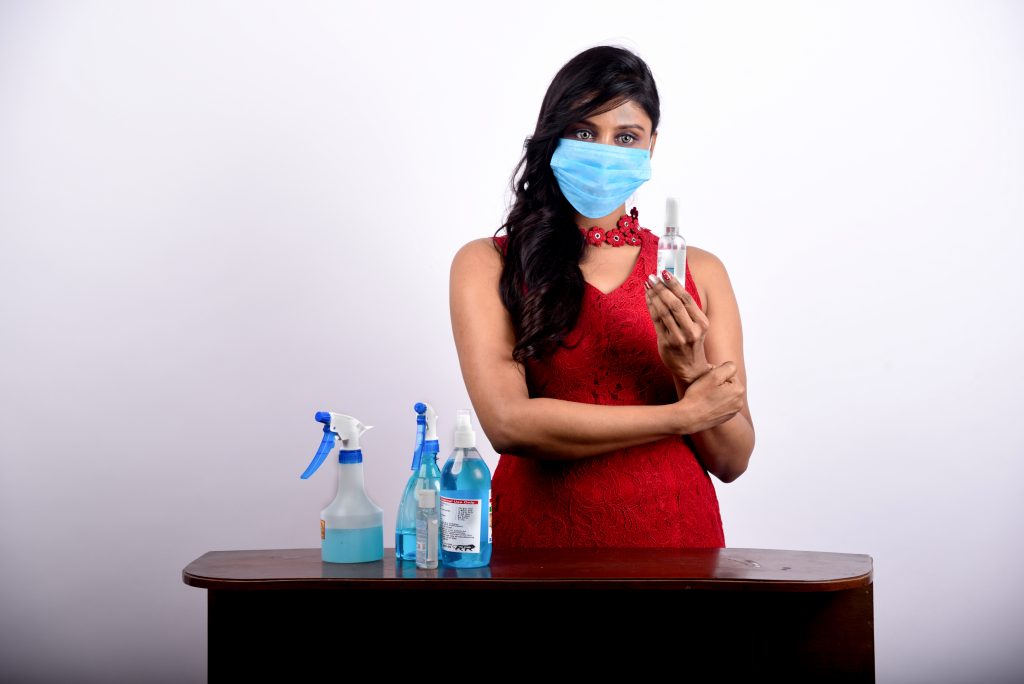 Model displaying hand sanitizer - PixaHive