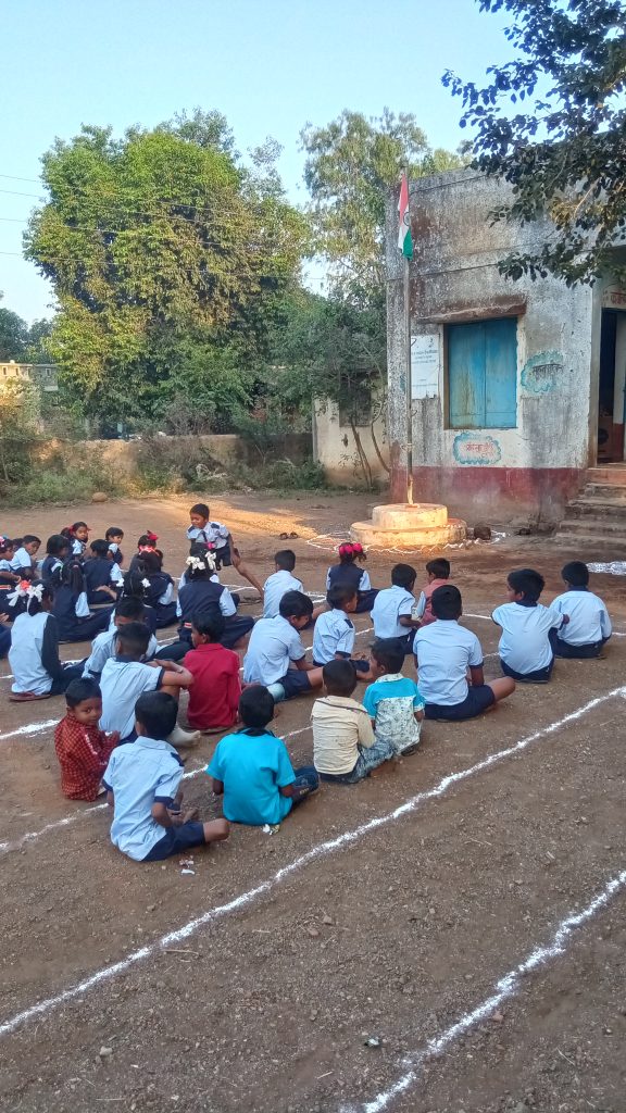 School students sitting on the ground - PixaHive