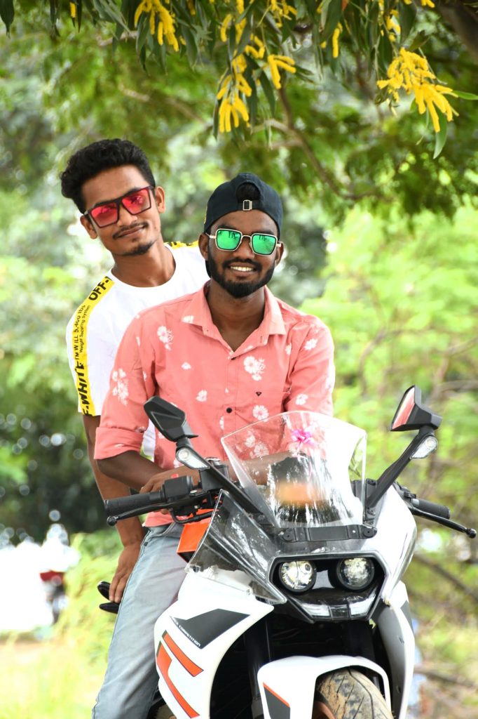 Two boys posing on bike - PixaHive