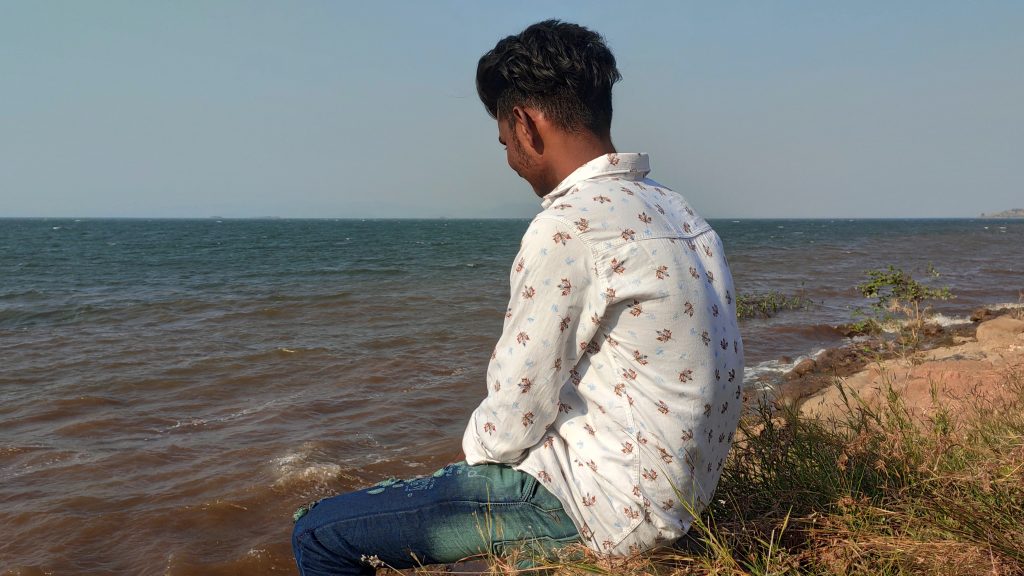 A boy on a beach - PixaHive