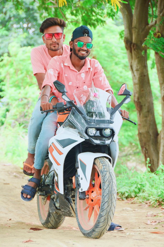 Boys posing on KTM bike - PixaHive