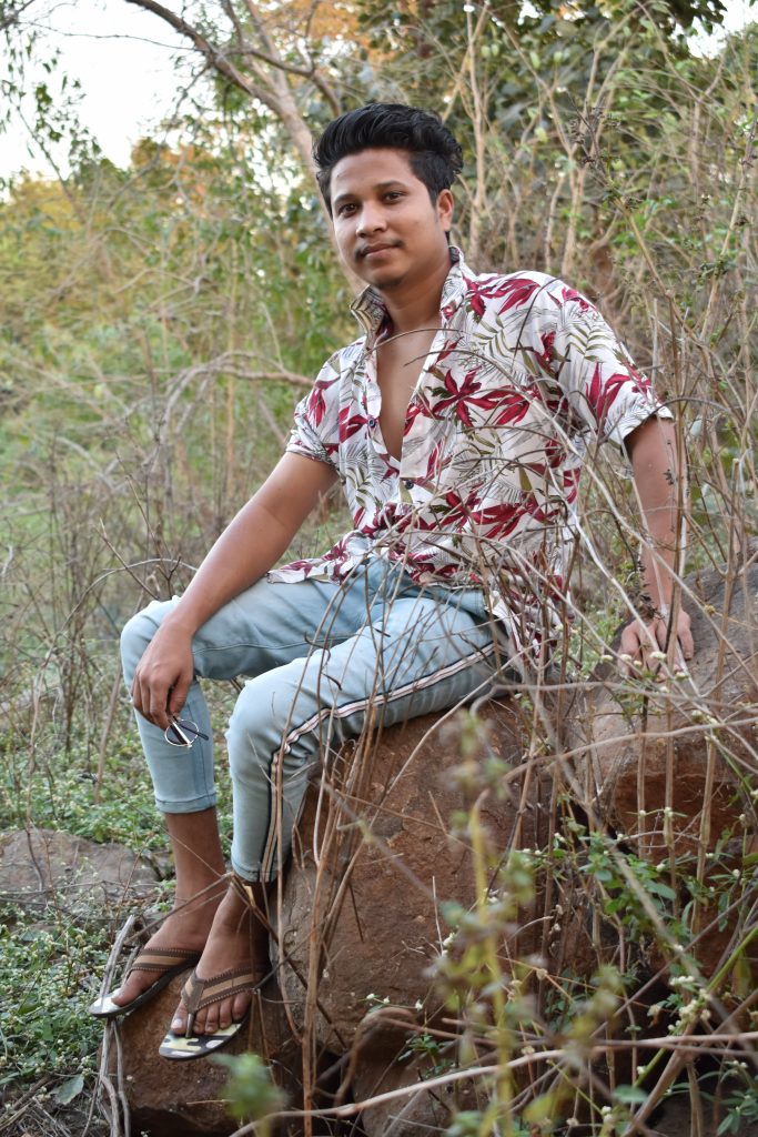 A boy on a rock - PixaHive