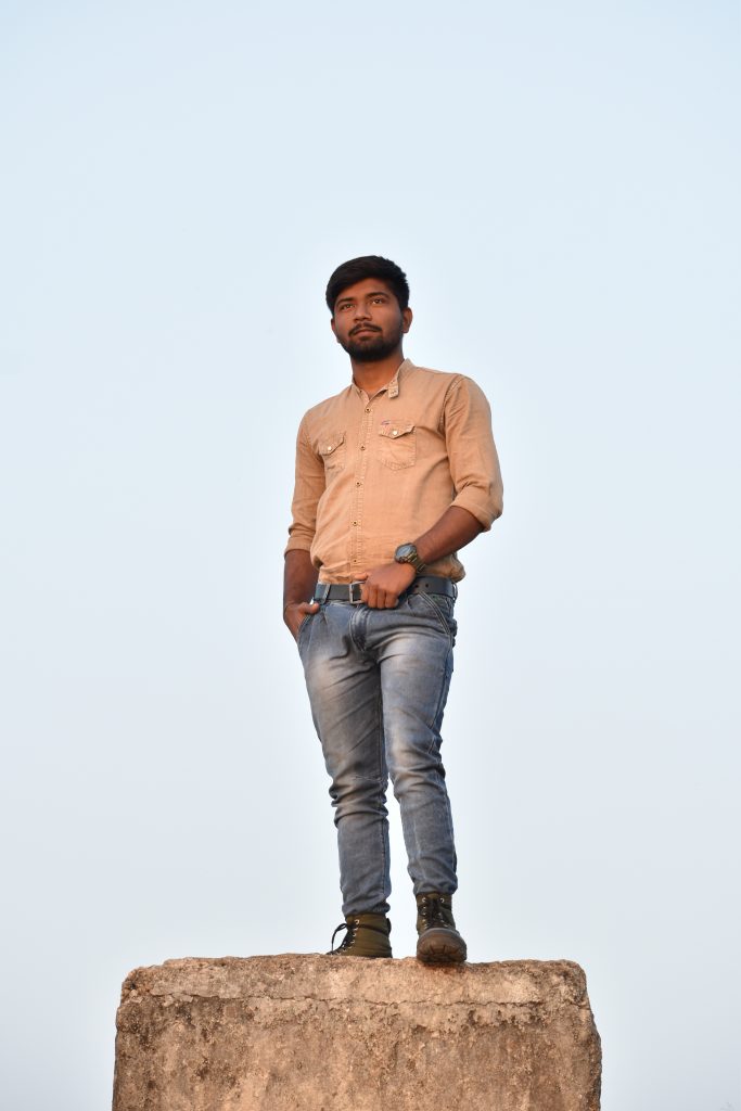 A boy on a stone - PixaHive