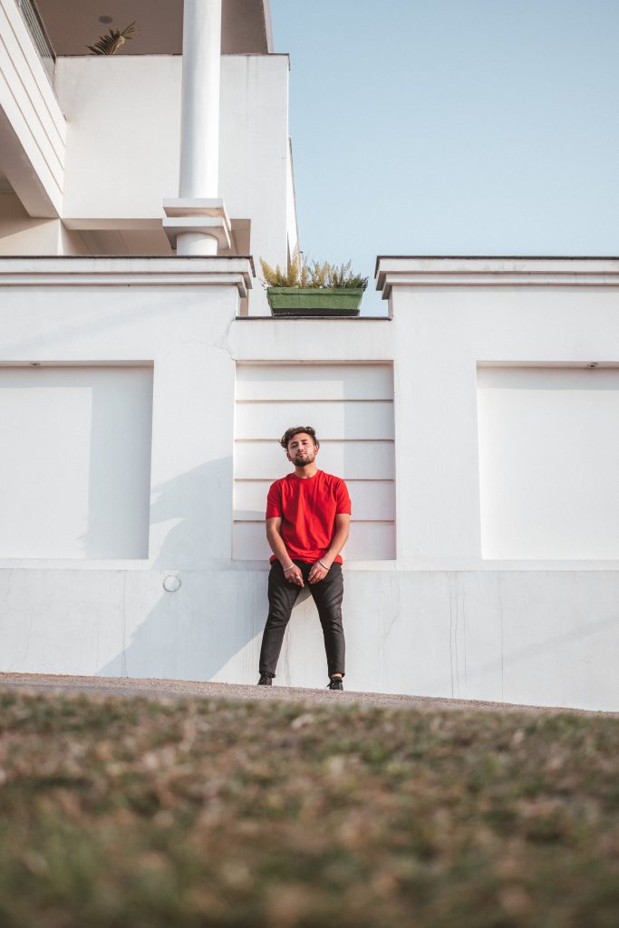 Boys sitting alone a wall - PixaHive