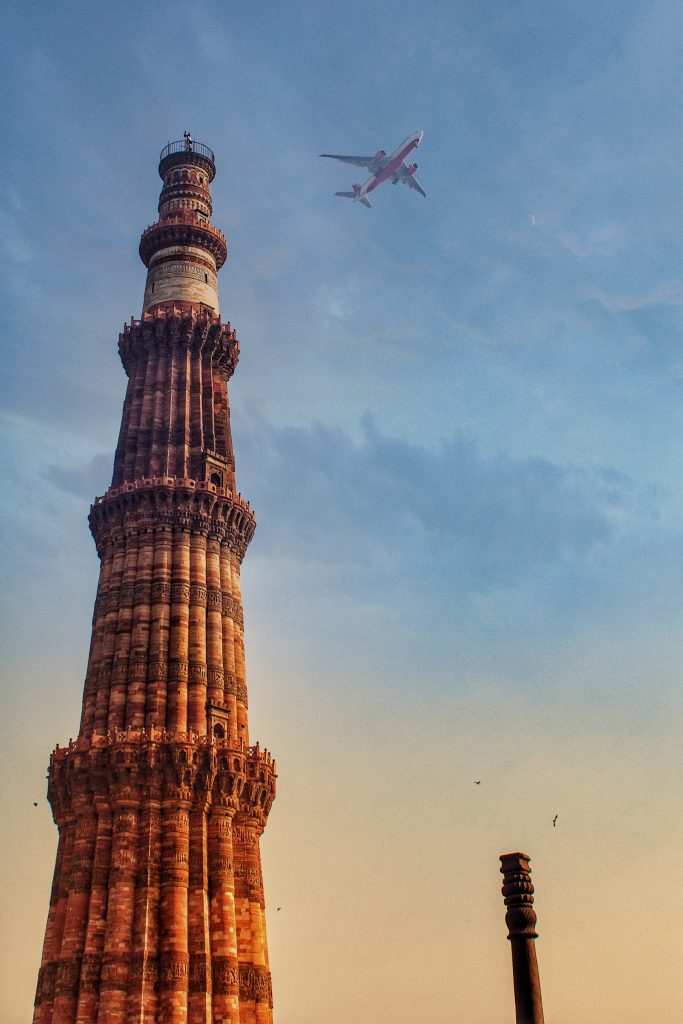 Airplane over Qutub Minar Monument - PixaHive