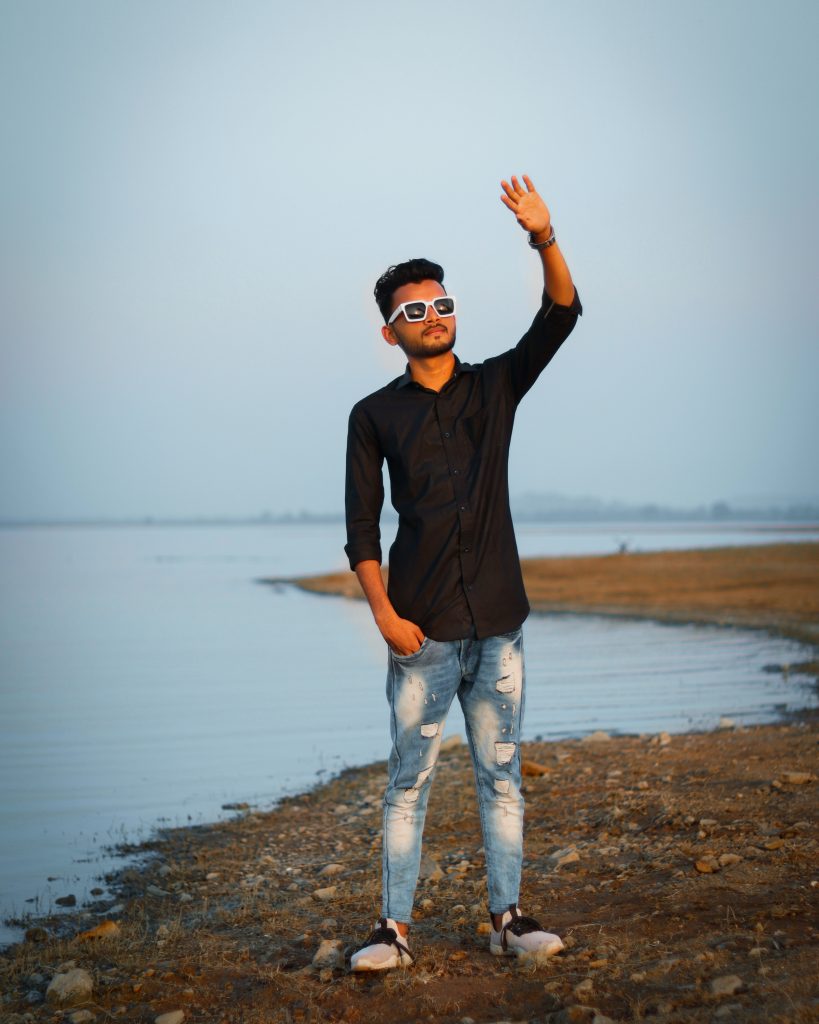 Boy posing near the river - PixaHive