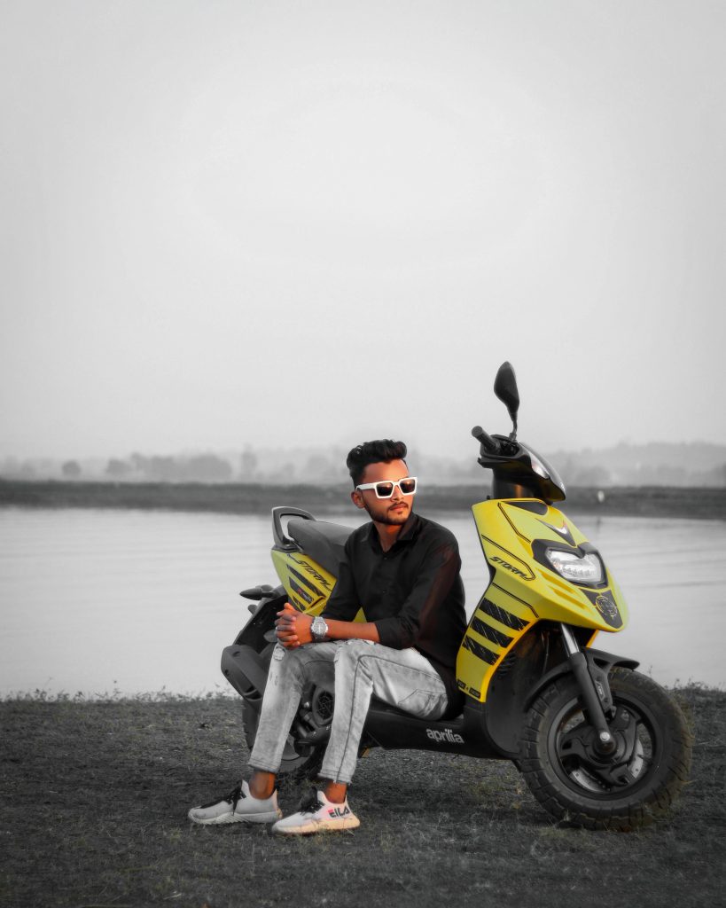 Boy posing on scotty near the river - PixaHive