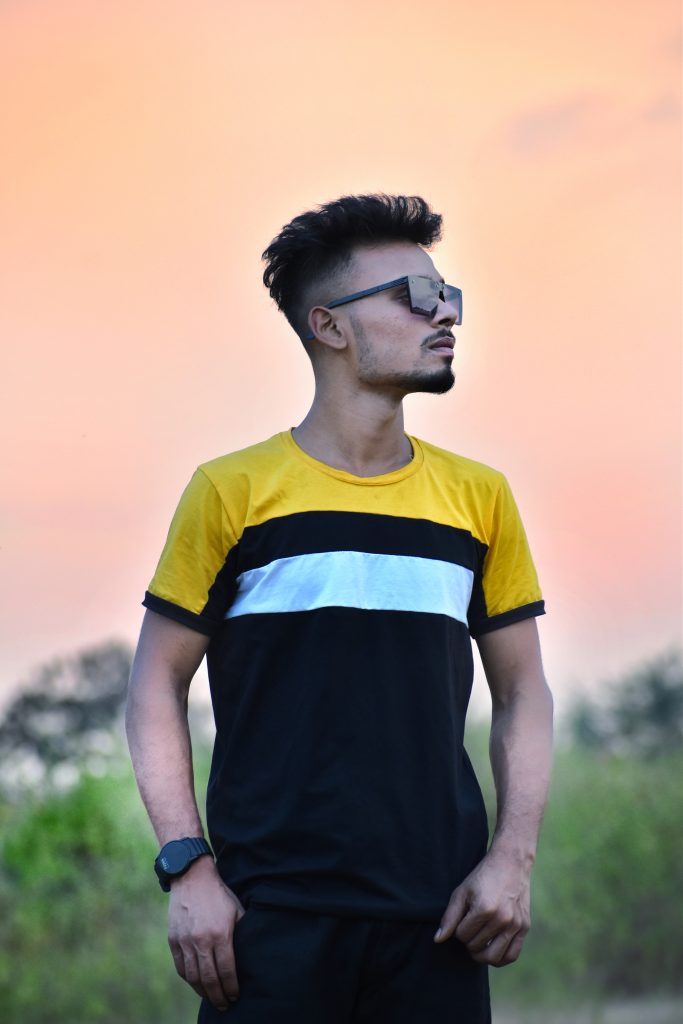 Boy posing while wearing sunglasses - PixaHive