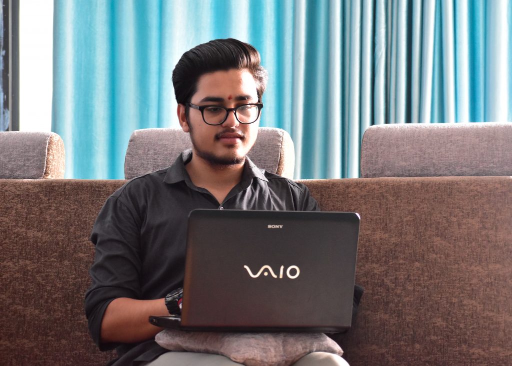 Boy working on Laptop - PixaHive