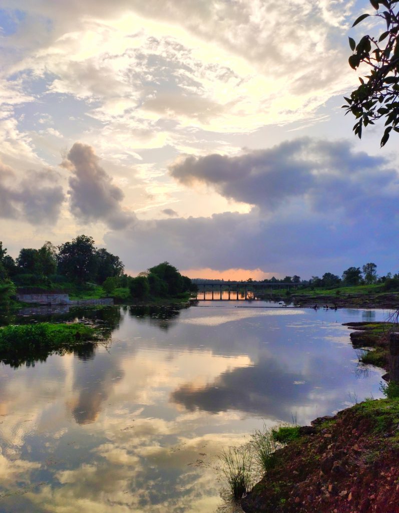 Clouds reflection in the river - PixaHive