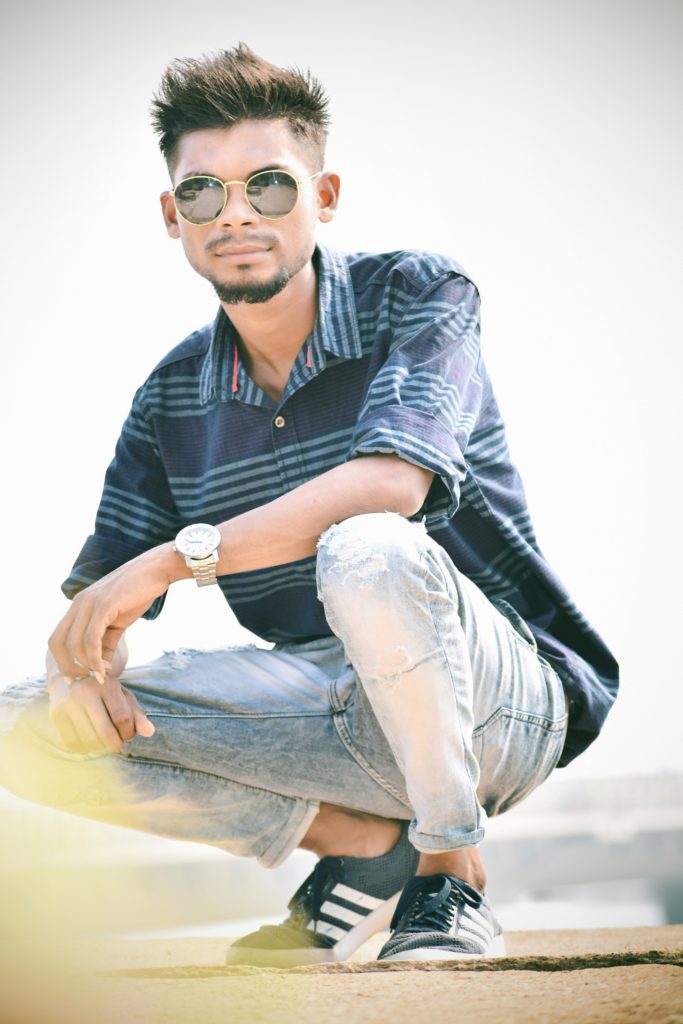 Model boy posing while sitting - PixaHive