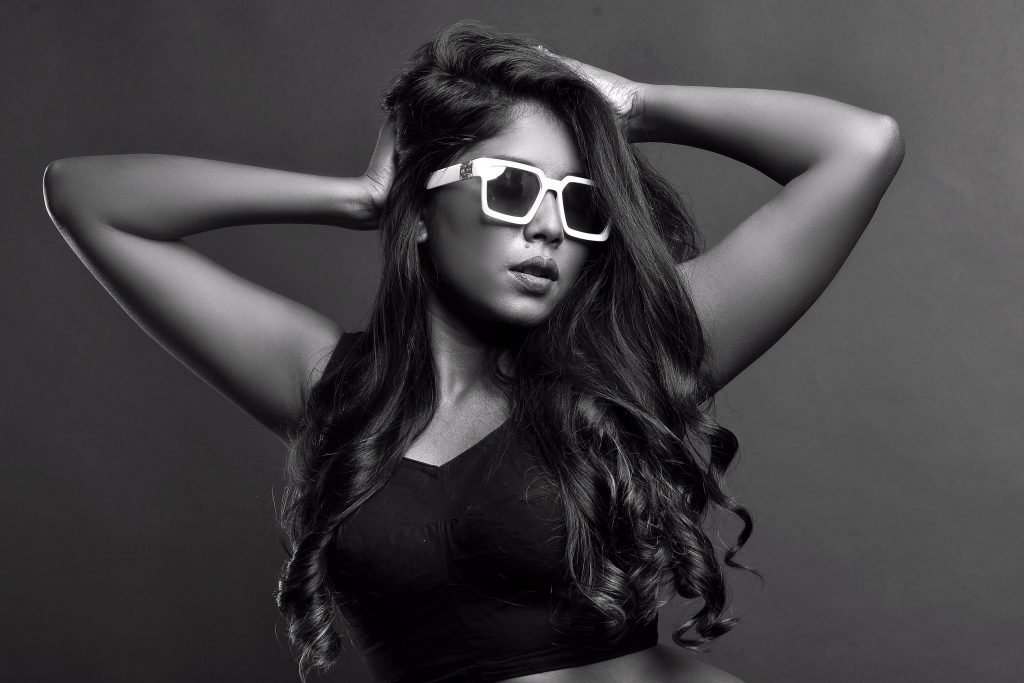 Female model posing with sunglasses - PixaHive