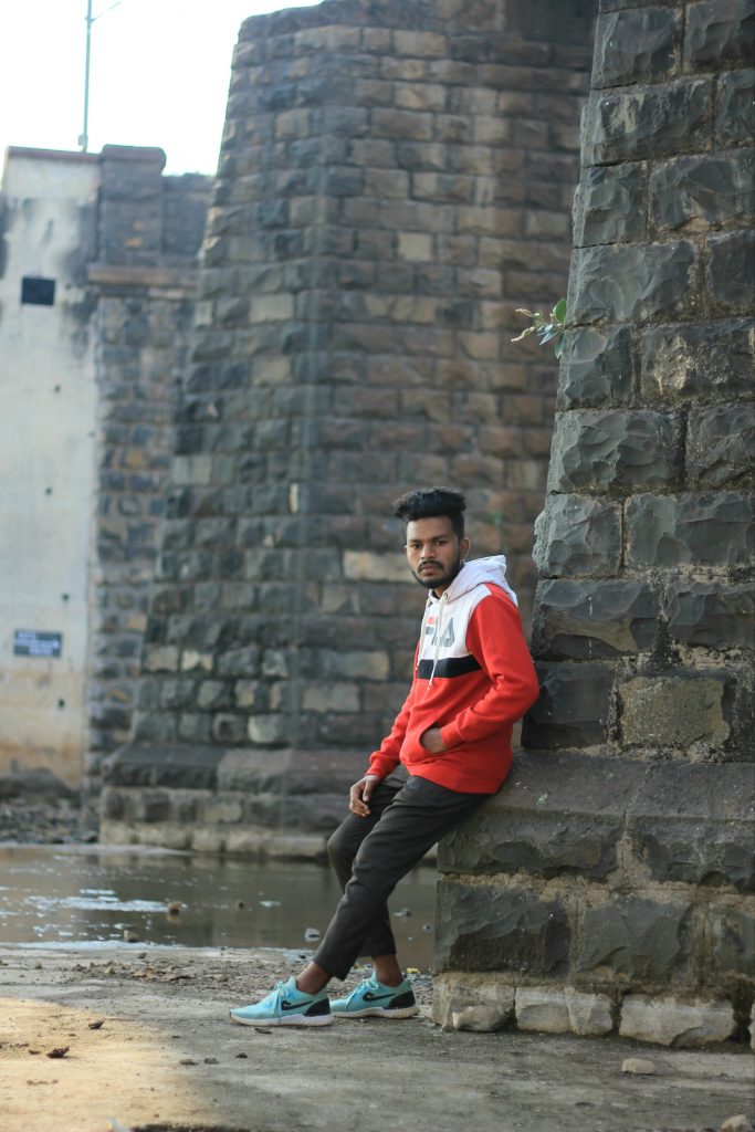 Male model posing against the wall - PixaHive