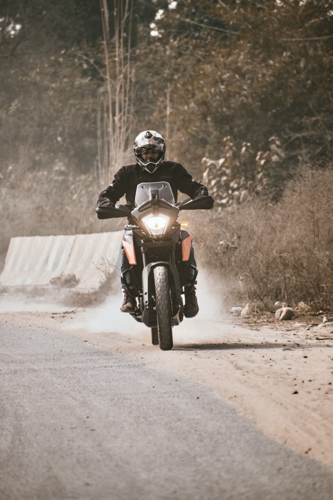 Man riding KTM bike on road - PixaHive