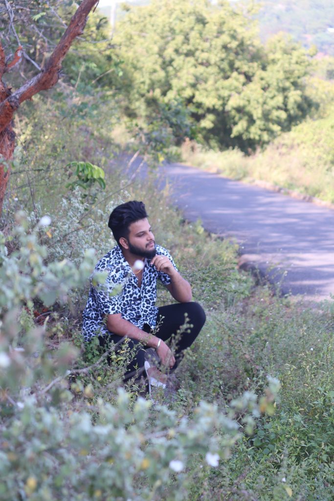 Man sitting and posing - PixaHive