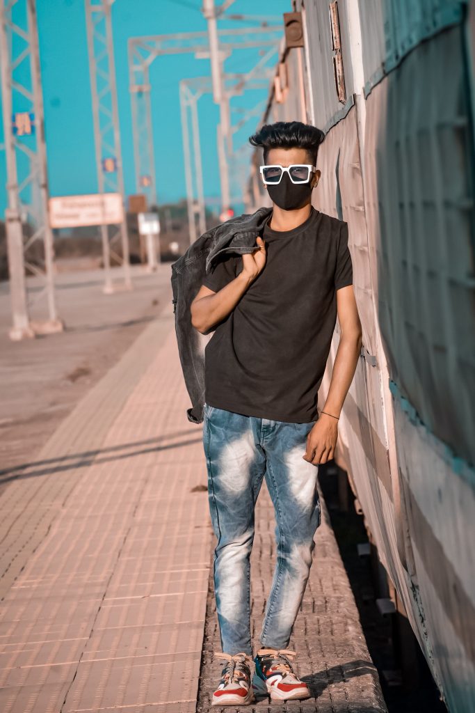 Model boy posing roadside - PixaHive