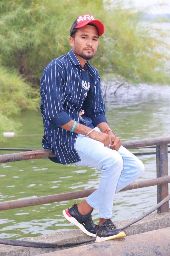 Model sitting on railing - PixaHive