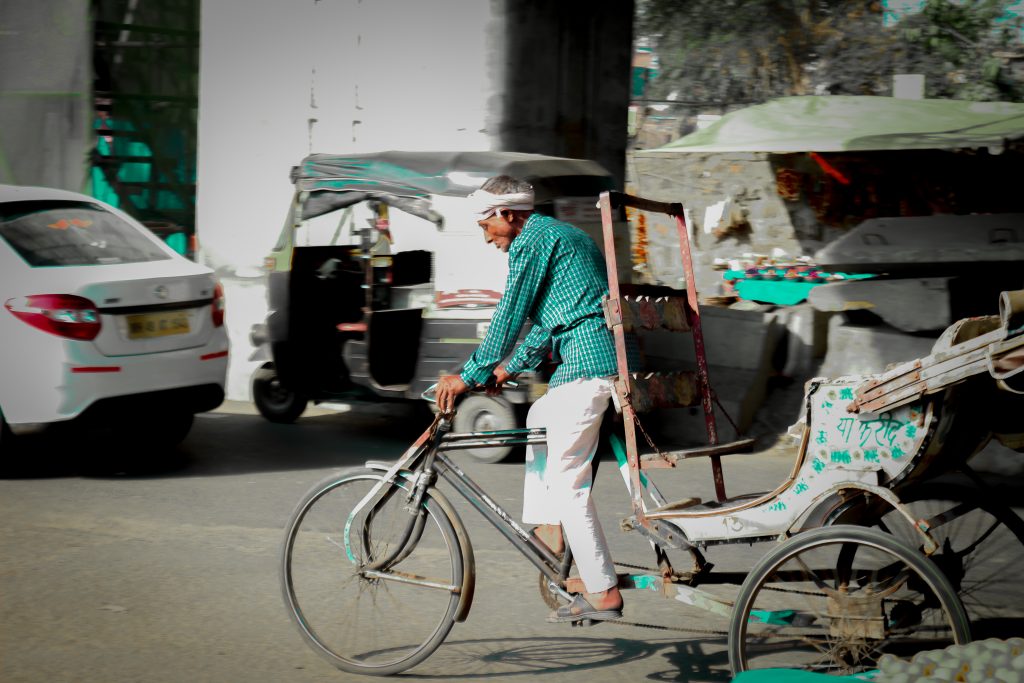 Old Man riding rickshaw - PixaHive