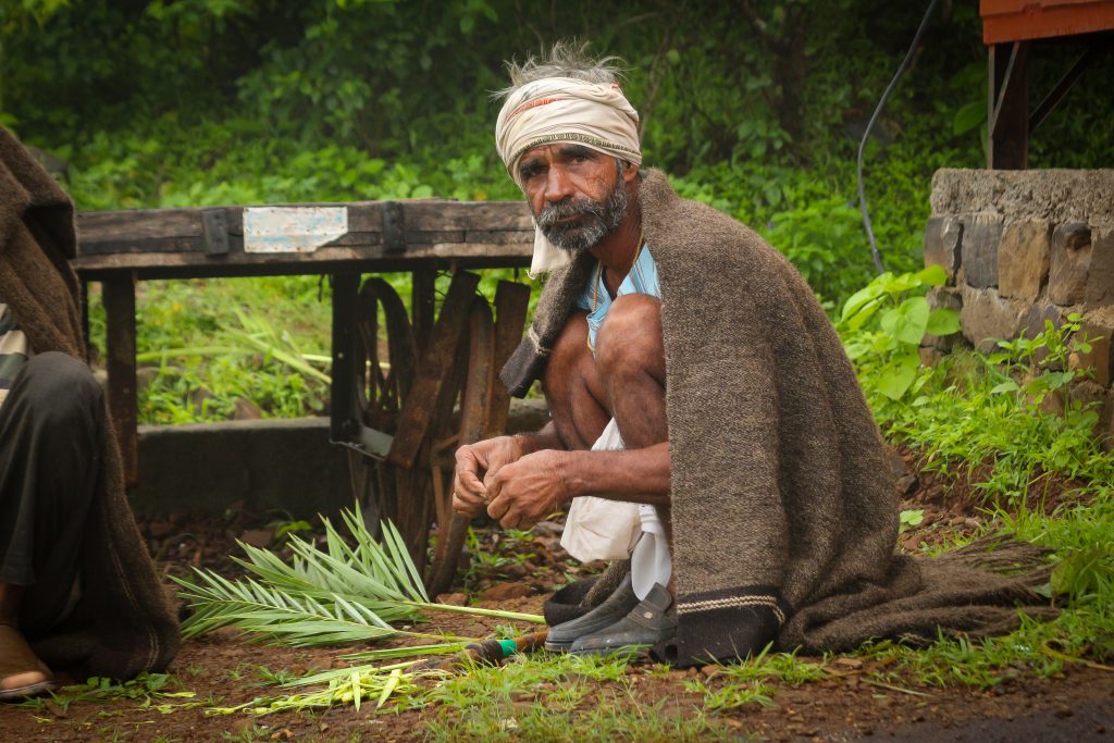Old man sitting in the farm - PixaHive