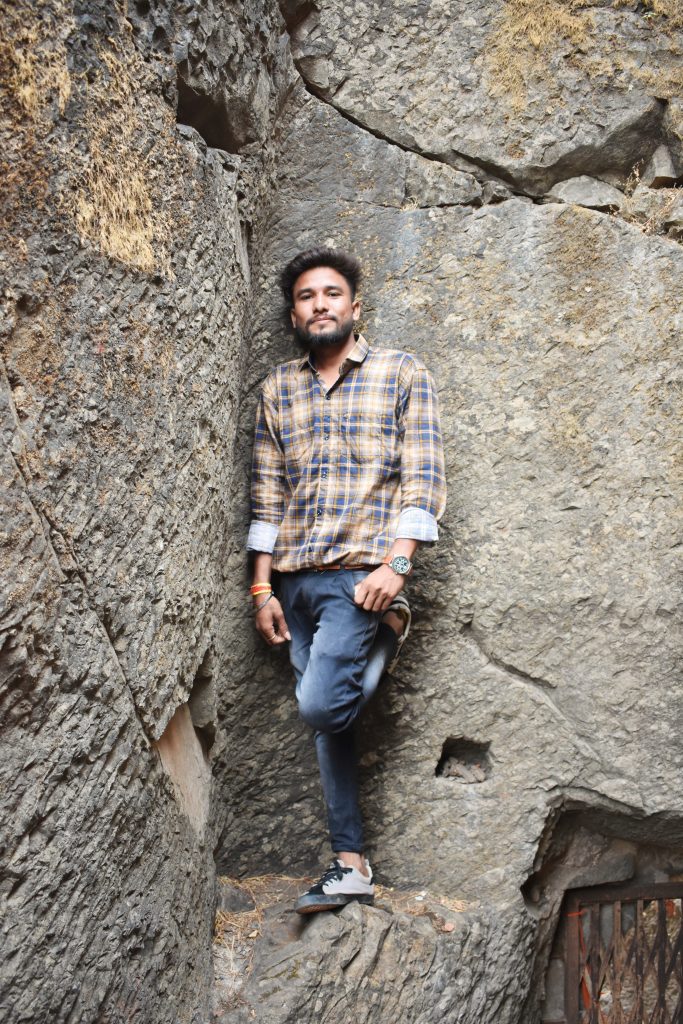 A boy under a rock - PixaHive