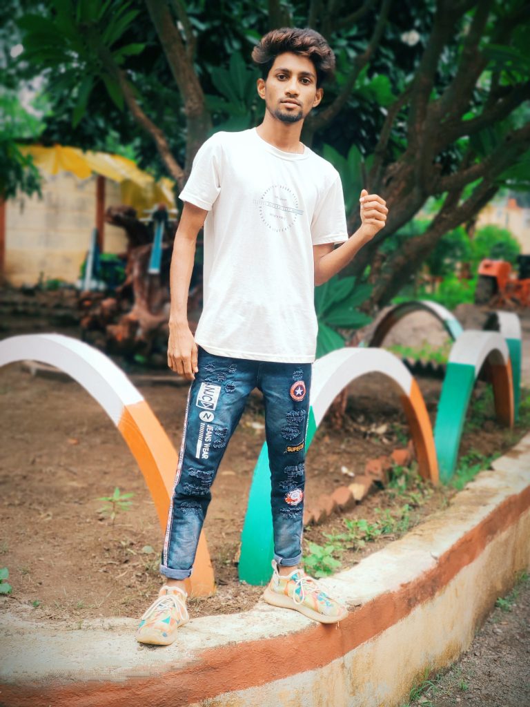 boy standing and posing in the park - PixaHive