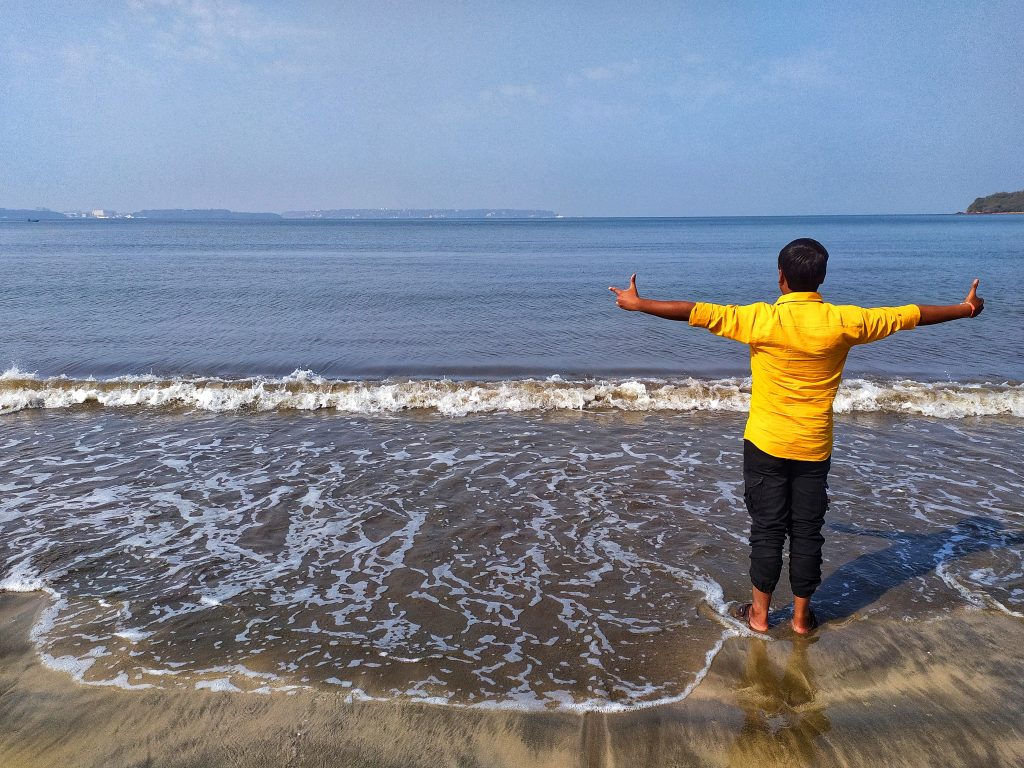 A boy on a beach - PixaHive