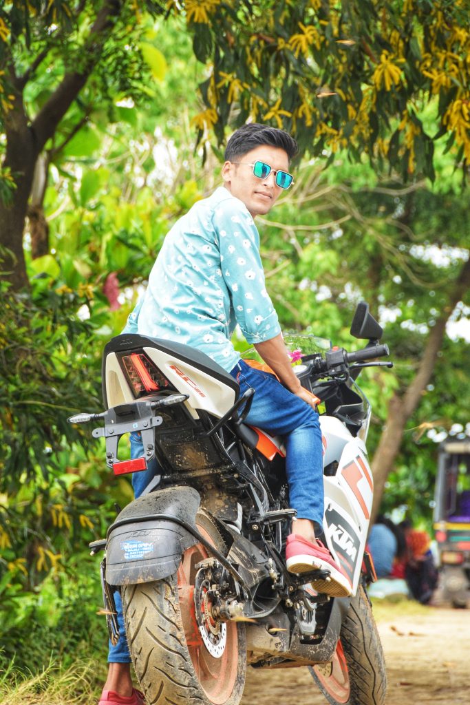 A male model on a bike - PixaHive