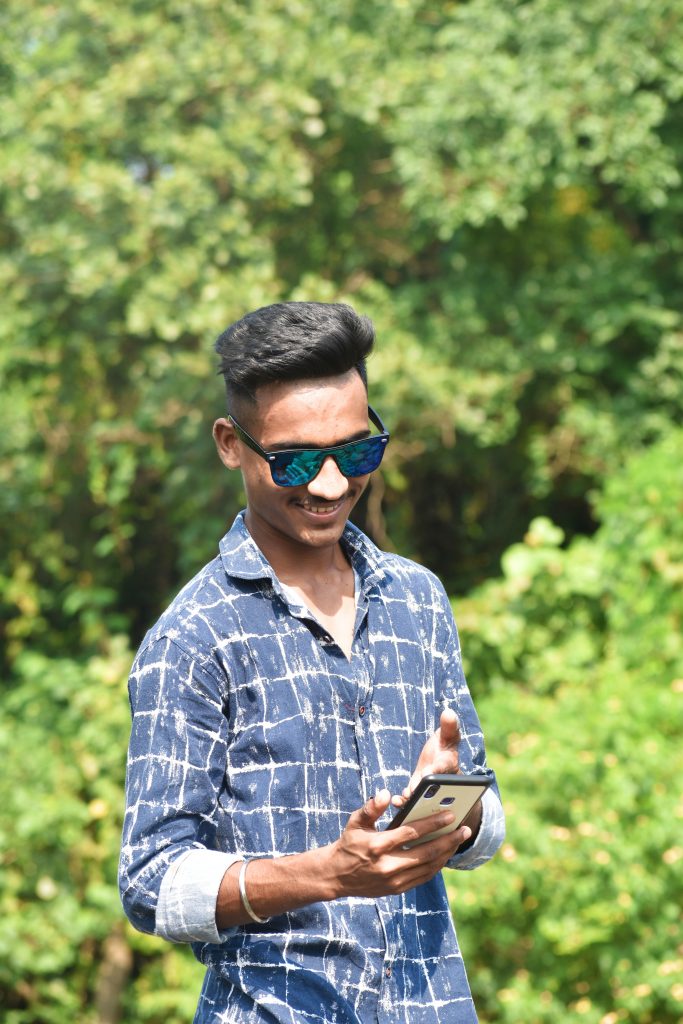 Boy smiling and posing in the forest - PixaHive
