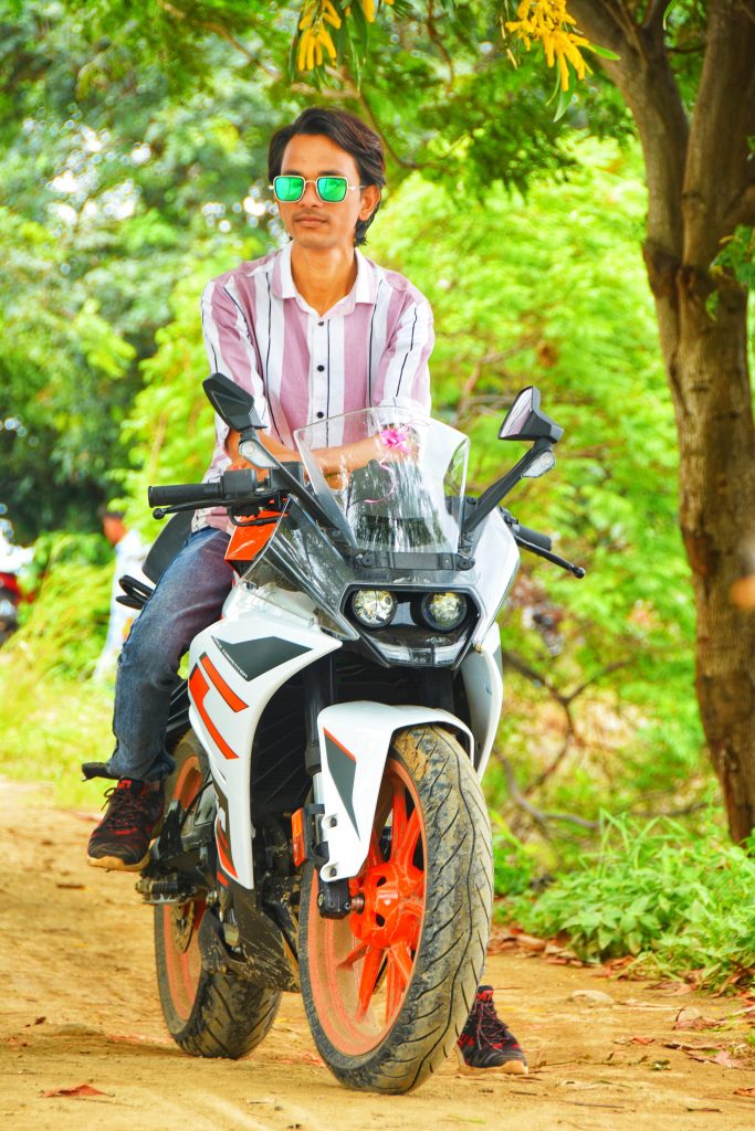 Handsome model photoshoot with bike - PixaHive