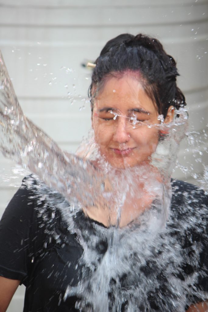 Splashing water on girls face - PixaHive