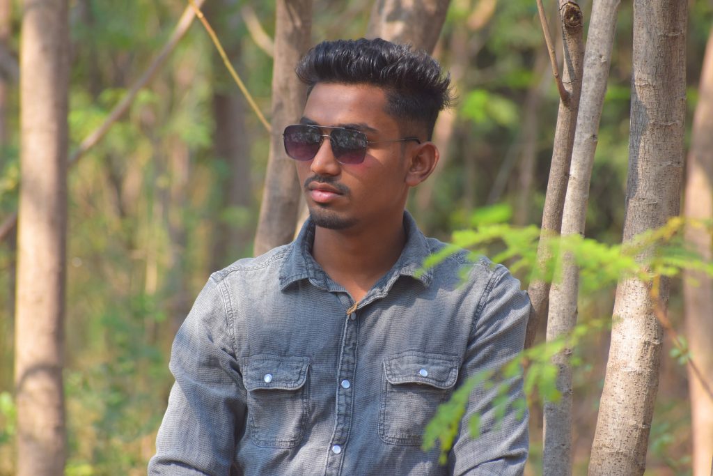 Stylish boy posing in the forest - PixaHive