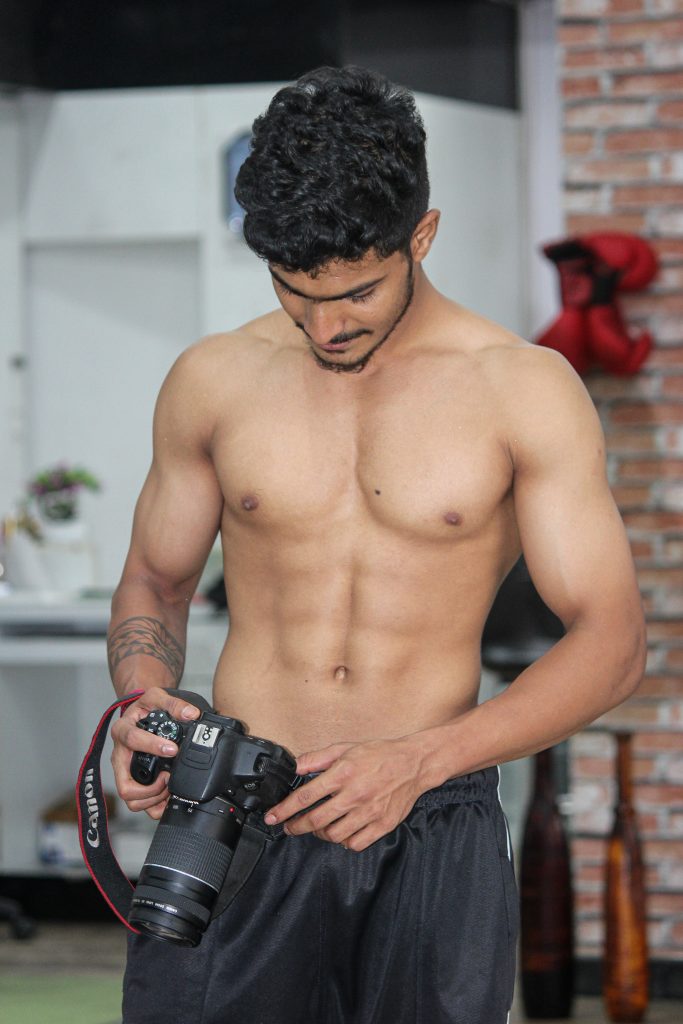 A fitness model with a camera - PixaHive