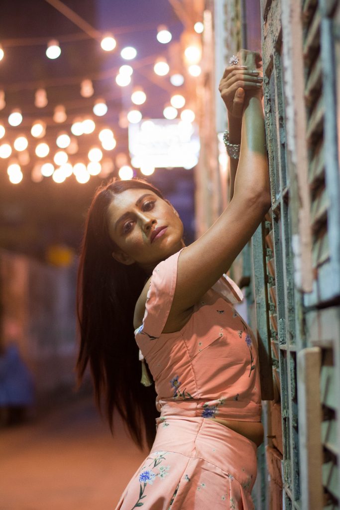 A stylish girl posing near a wall - PixaHive