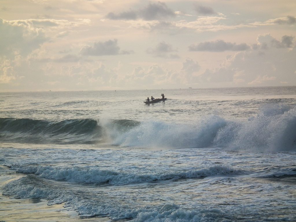 A boat floating along sea waves - PixaHive