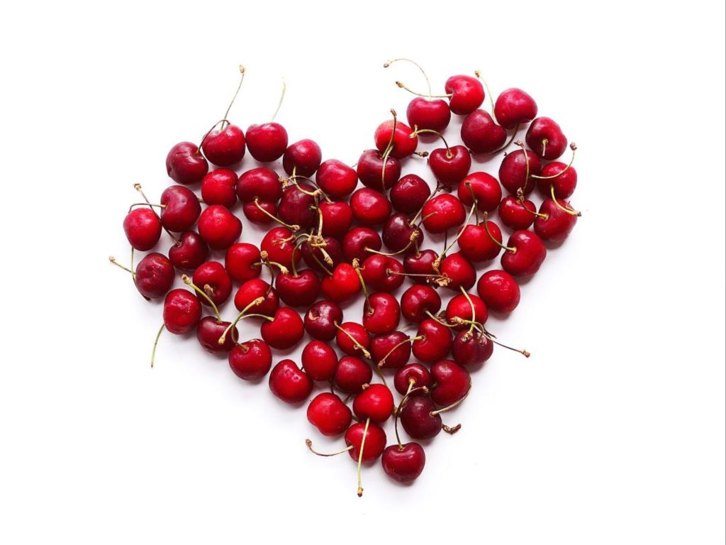 Heart shape made with red berries - PixaHive