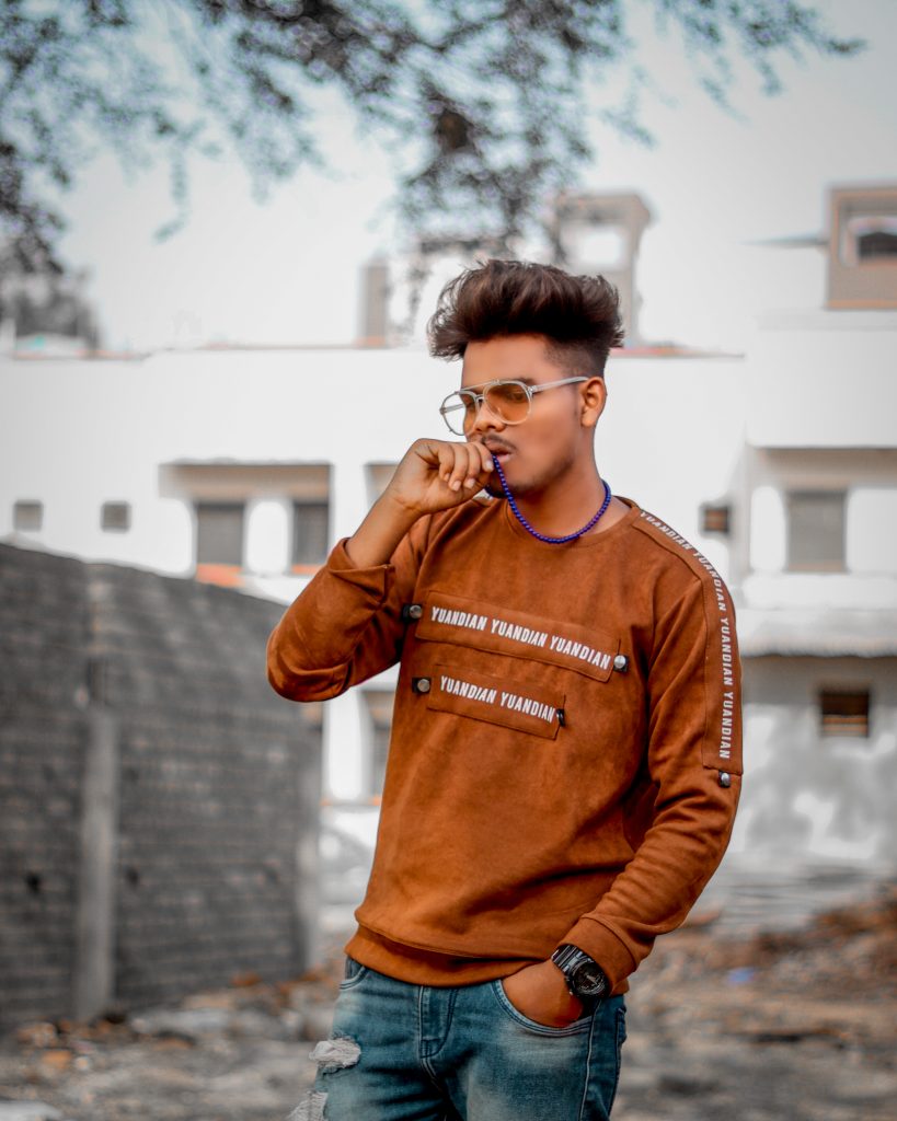 Stylish boy posing with locket - PixaHive