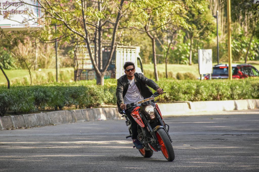 A boy riding a KTM Duke bike - PixaHive